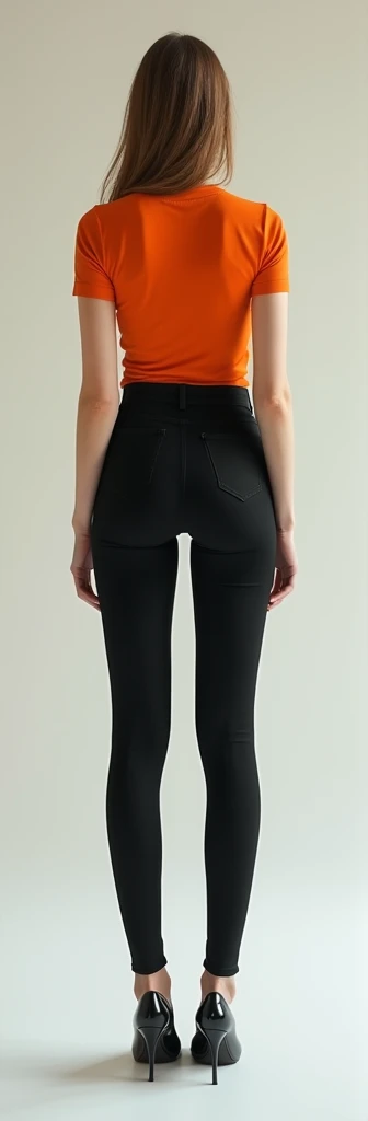 Back view of full body of tall, skinny woman in black pants and orange ...
