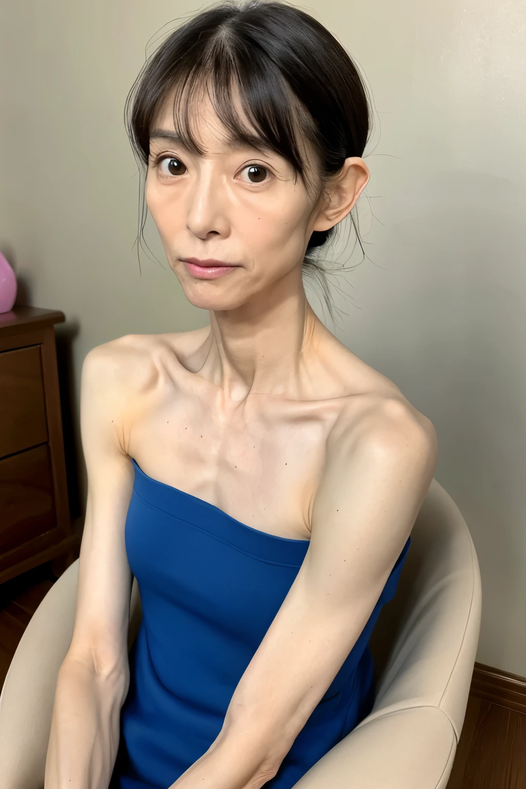 There is a woman sitting in a chair with a blue dress - SeaArt AI