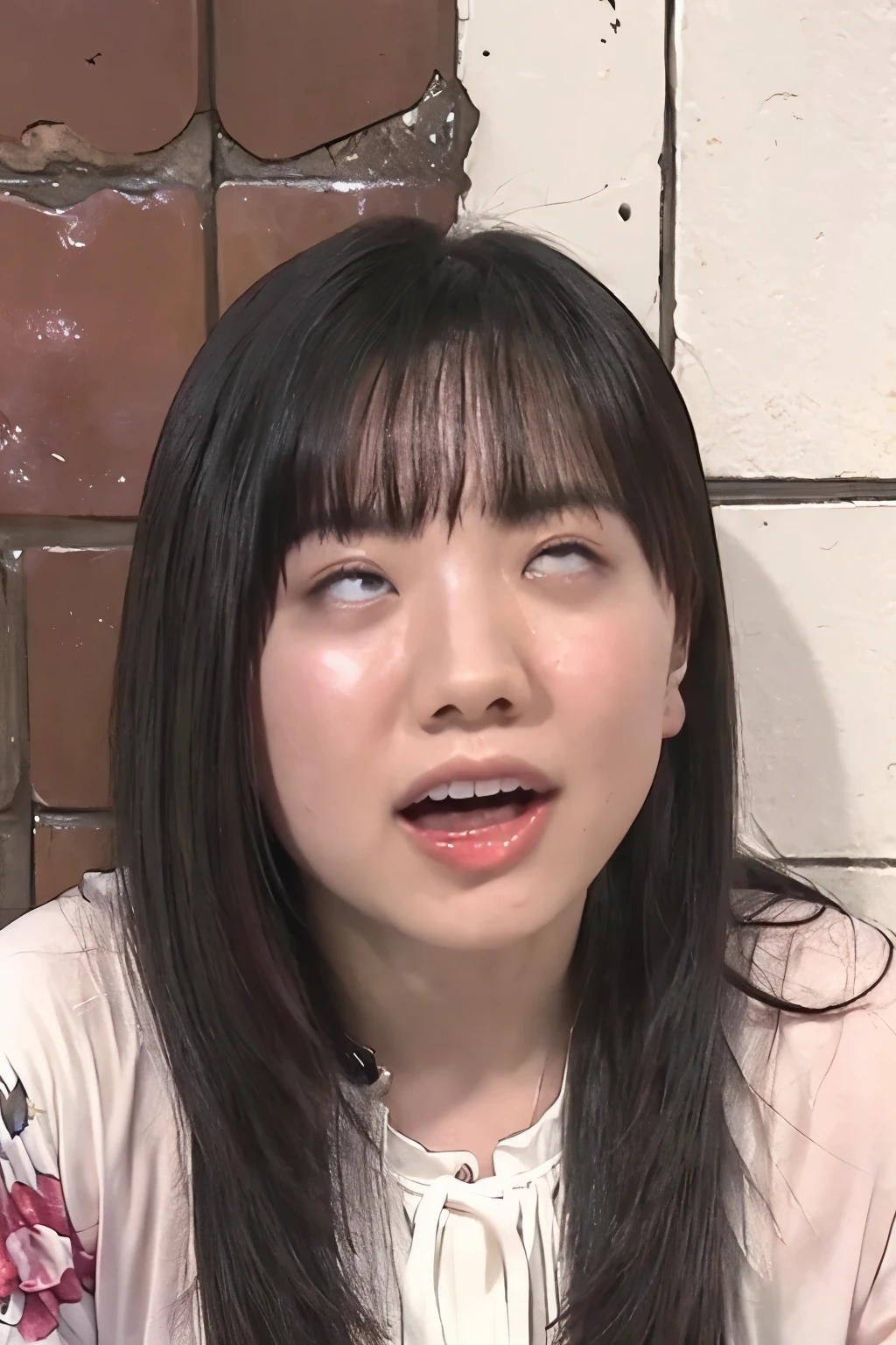 Arafed woman with long black hair and bangs sitting in front of a brick ...