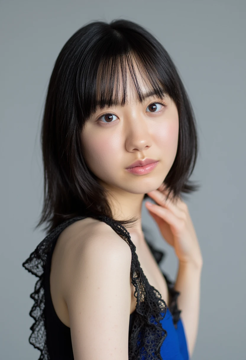 The image is a photograph of a young Asian woman, Manachan, with a fair ...