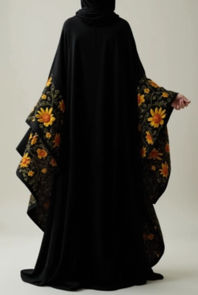 A realistic photograph of a black abaya with wide, flowing sleeves ...