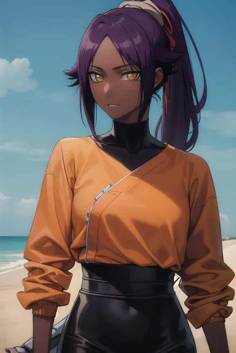 A woman in a yellow shirt and black shorts standing on a beach（shihouin ...